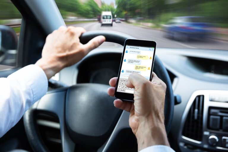 What Are the Most Common Types of Distractions While Driving? - Olan Law